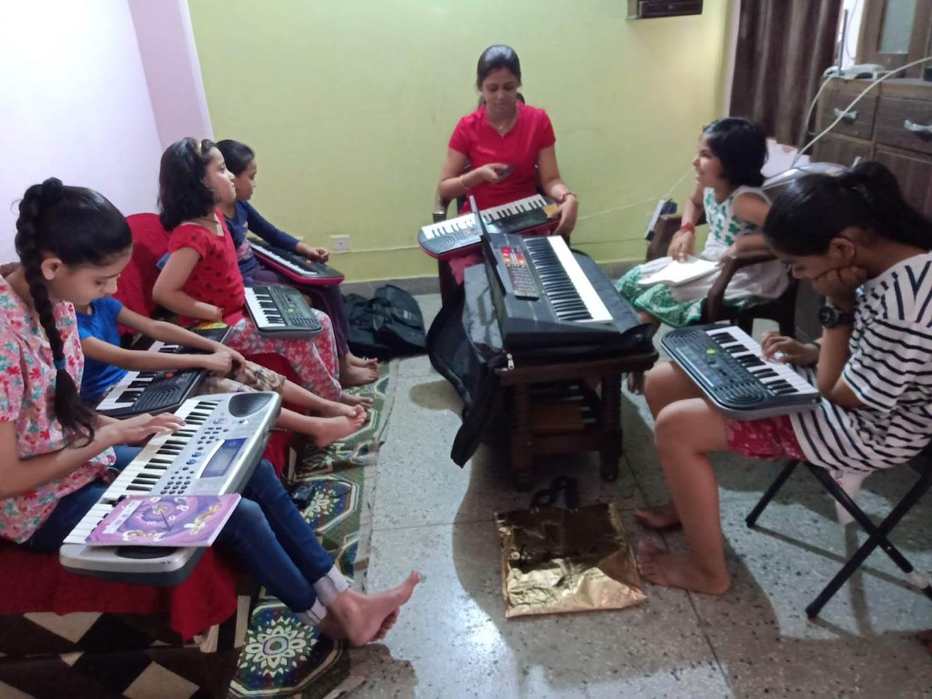 Swar Sudha Music Classes for Classical Vocals Harmonium Keyboard | Sec – ActivityKidz